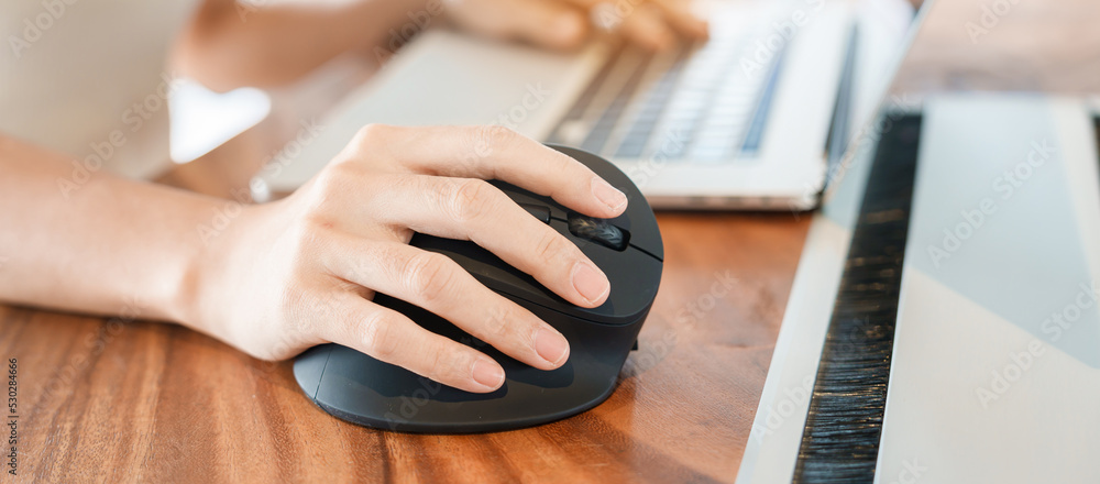 woman hand using computer ergonomic mouse, prevention wrist pain ...