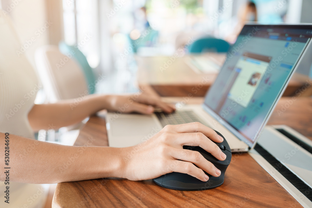 woman hand using computer ergonomic mouse, prevention wrist pain ...