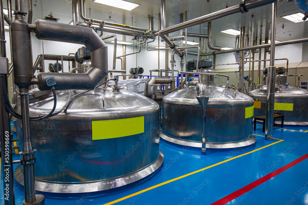 Stainless vertical steel tanks with equipment tank chemical cellar at ...