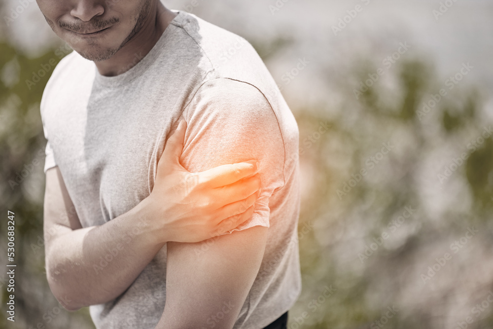Arm, muscle or pain injury of man during fitness, workout or outdoor ...