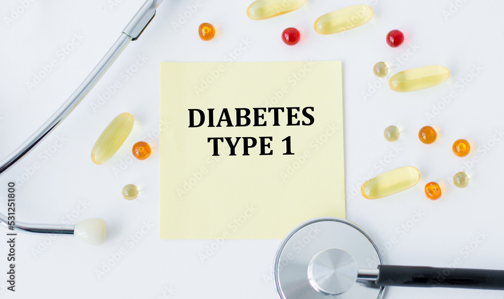 Diabetes type 1 text on a card on a white background next to it lies a ...