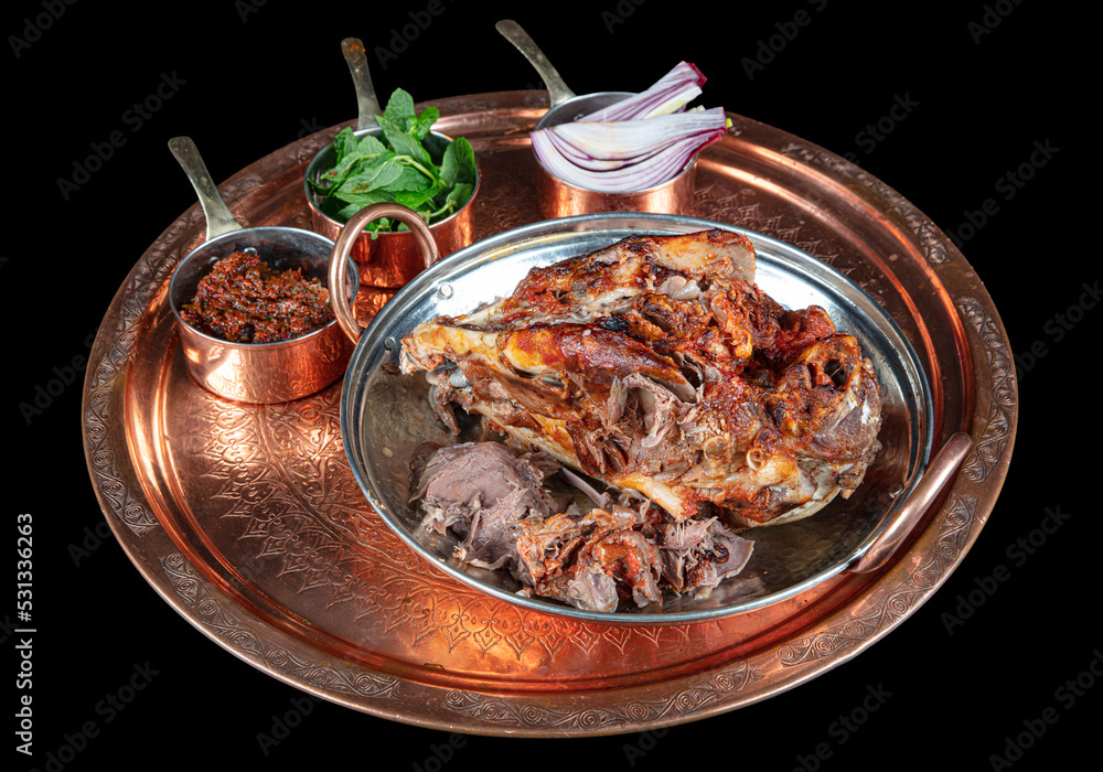 Roasting head of a lamb. Traditional Turkish Offal Food Kelle Sogus ...