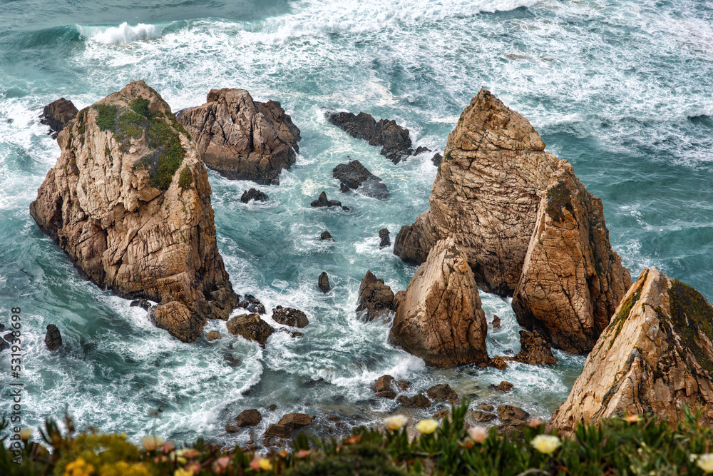 Cliffs on the coast of Atlantic ocean, Cape Rock, Praia da Ursa Beach ...