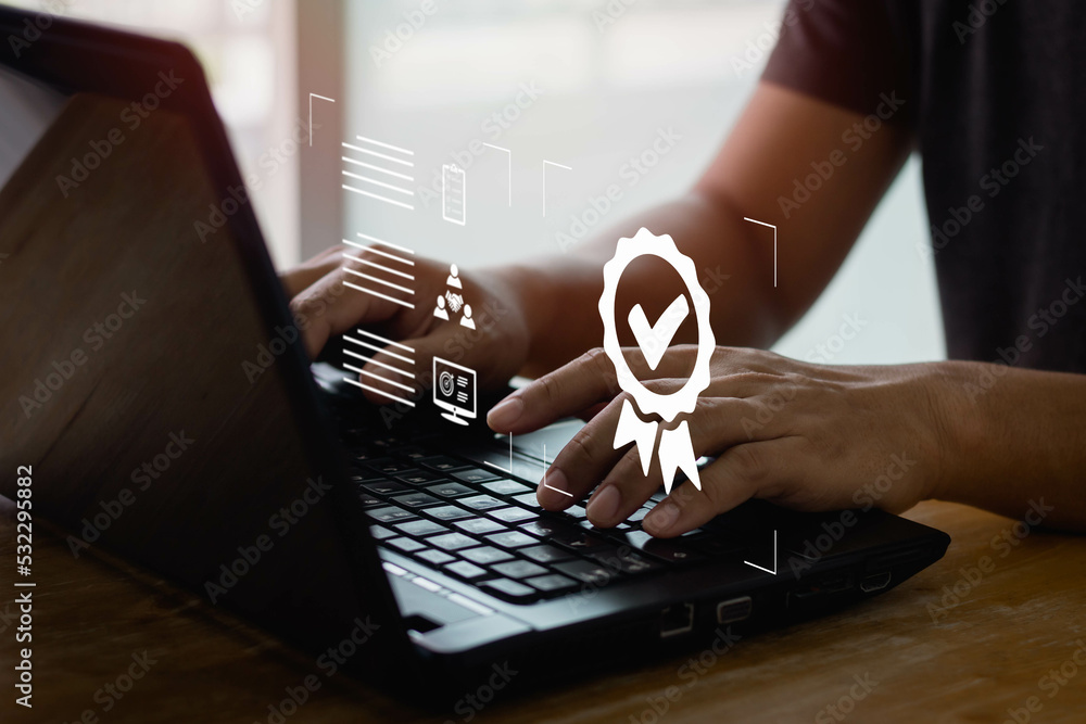 Businessman working with the sign of the top service Quality assurance, Guarantee, Standards ...