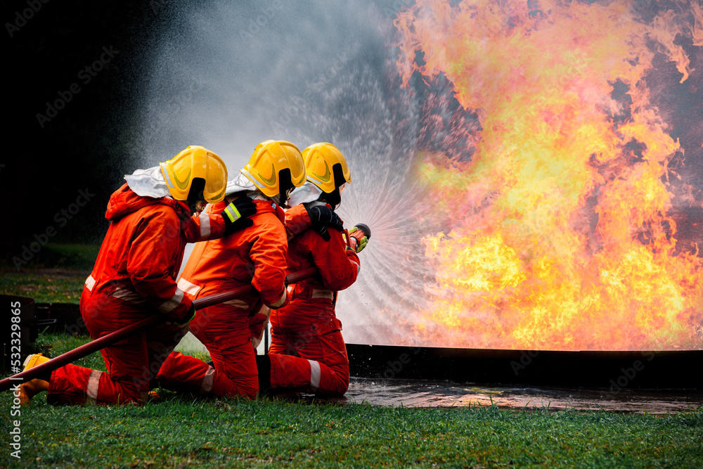 Firefighters safety using twirl water fog type fire extinguisher to ...
