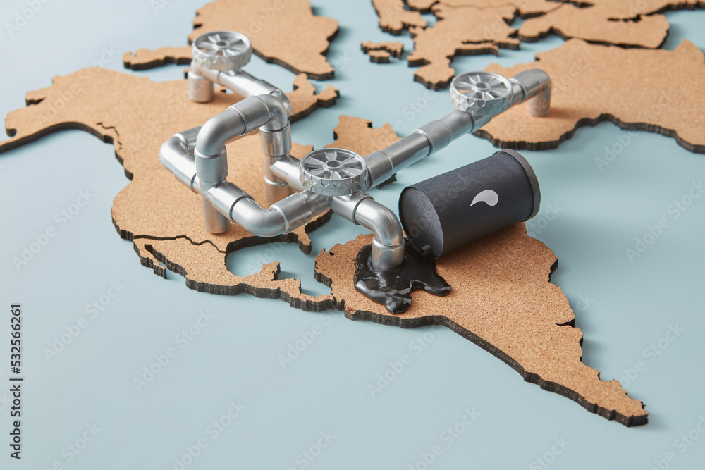 Pipeline over Americas map with puddle of oil. Stock Photo | Adobe Stock