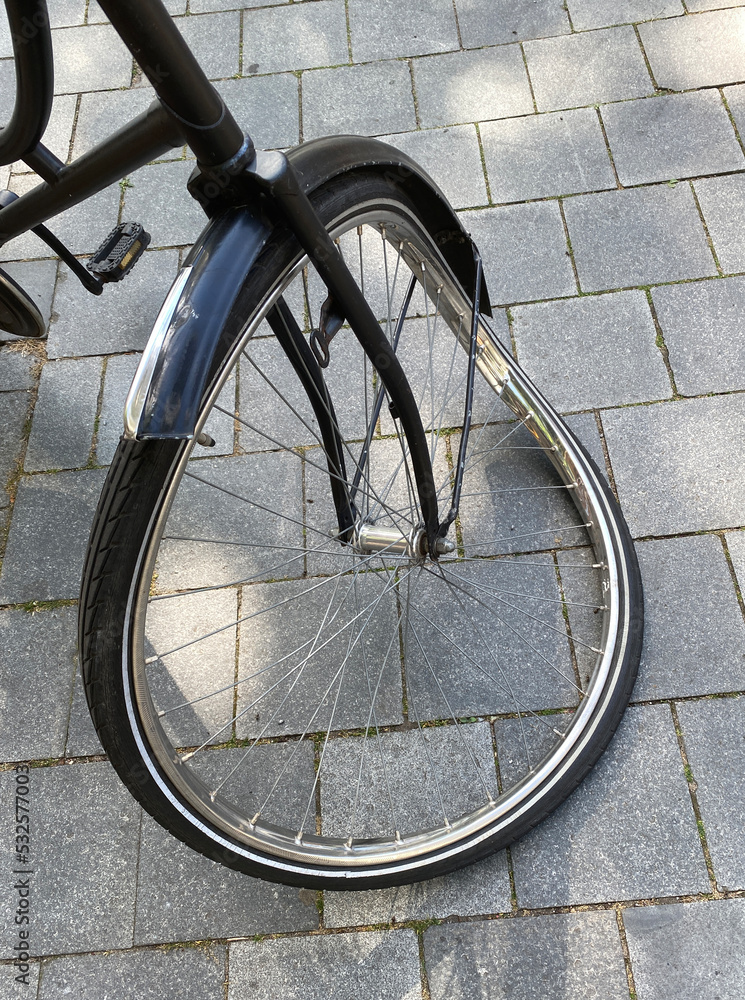 crooked bicycle wheel Stock Photo | Adobe Stock