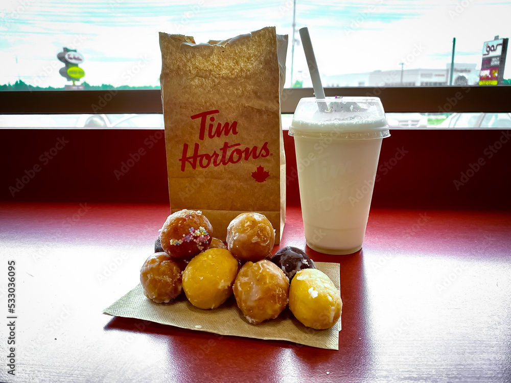 Tim Hortons bag of Timbits doughnut holes and milkshake. Tim Hortons ...