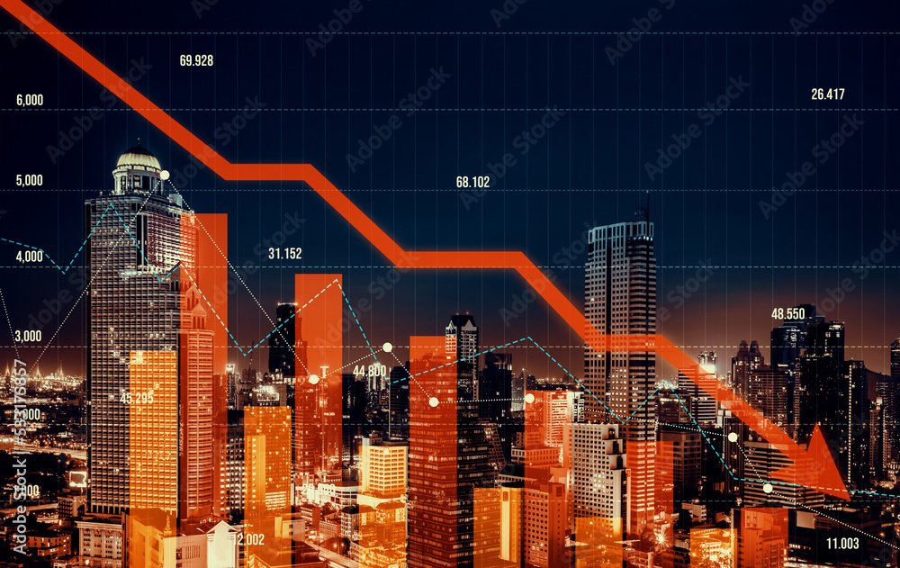 Economic crisis concept shown by declining graphs and digital ...