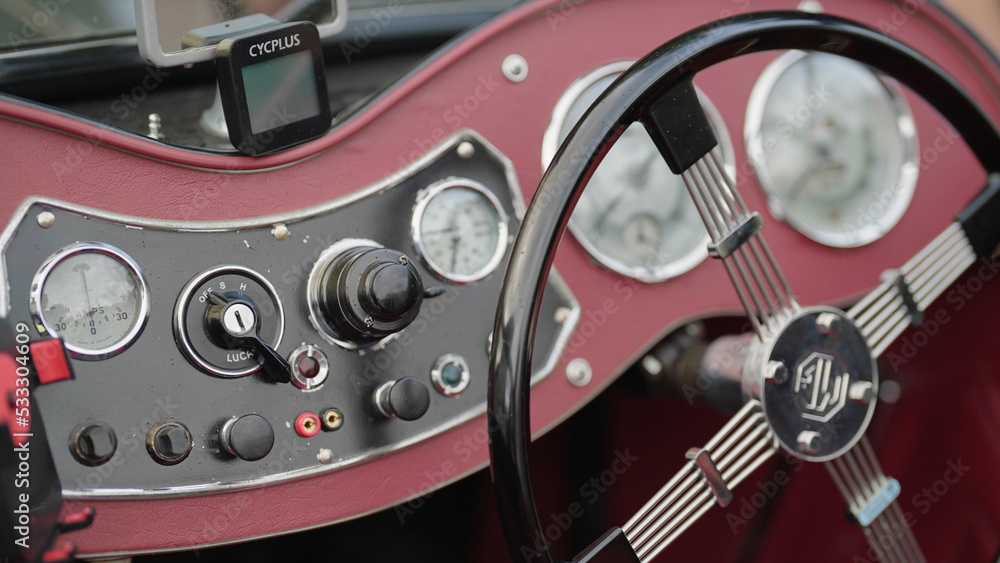 Old-fashioned car dark dashboard with huge steering wheel Stock Photo ...
