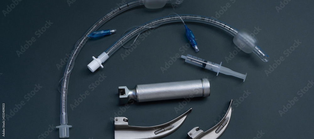 tracheal intubation kit: laryngoscope, several laryngoscope blades and ...