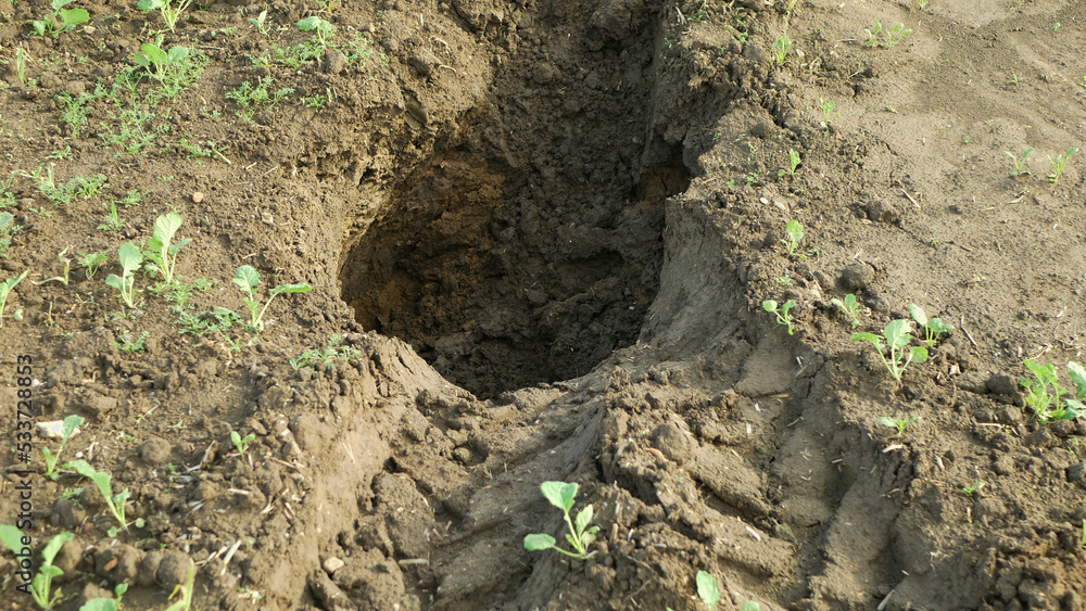 Fields subsoil erosion damage tractor track hole pit soil ...