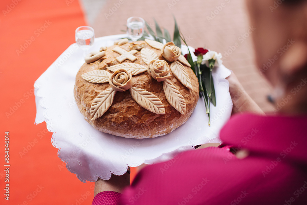 Wedding tradition in Poland and Russia. Parents welcome bride and groom ...