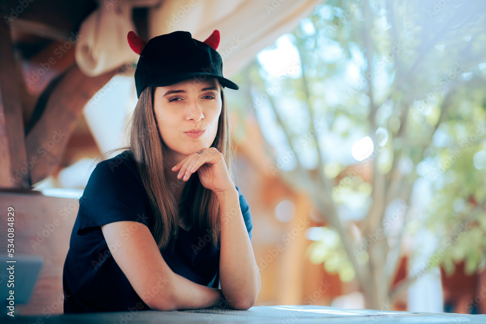 Funny Smug Girl Smirking and Wearing a Hat with Devil Horns. Arrogant ...