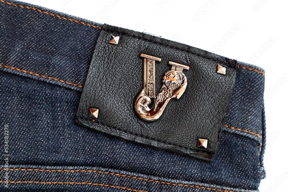 Label of a VERSACE JEANS denim. VJ is an Italian luxury fashion house ...