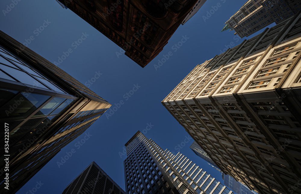 Wide angle photo with tall modern and vintage architecture skyscrapers ...