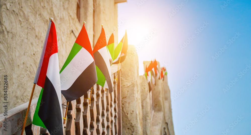 Flags installed in traditional Arabic architecture in Arabian Heritage ...