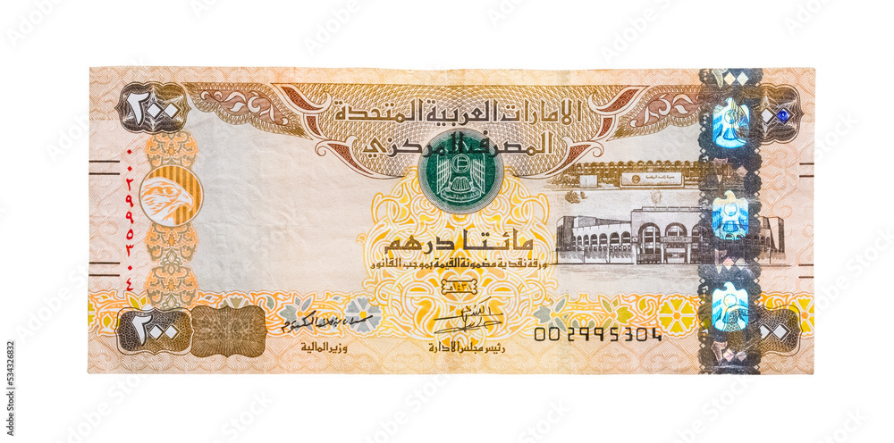 Closeup of UAE 200 dirhams currency notes on light wooden table from ...