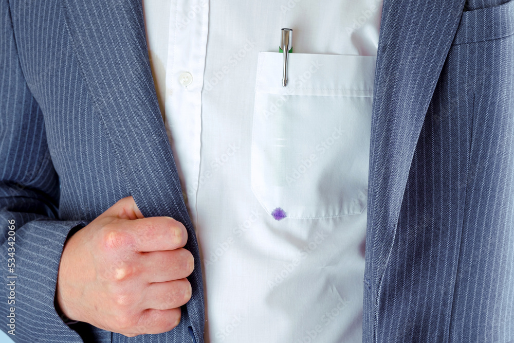 Stock-Foto „The man undressing off his suit and showing a pen exploding ...