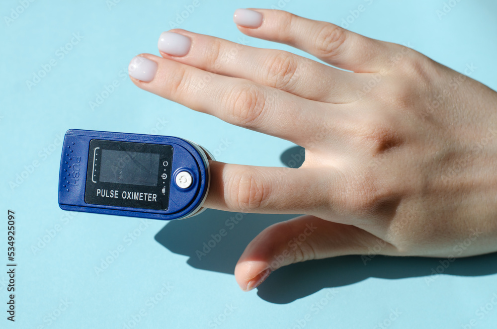 Pulse oximeter. Medical device on the finger. Patient diagnosis. Covid-19. Saturation ...