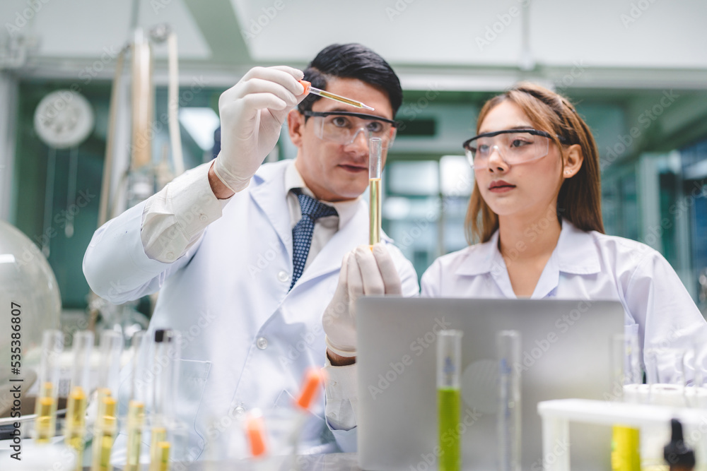 Health care researchers working in life science laboratory, medical ...