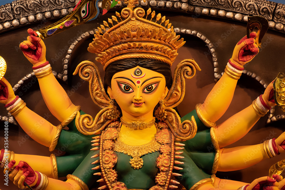 Idol of Goddess Devi Durga at a decorated puja pandal in Kolkata, West ...