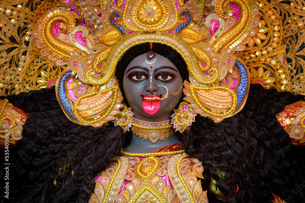 Idol of Goddess Maa Kali at a decorated puja pandal in West Bengal ...