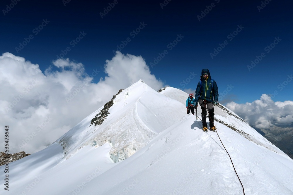 Multi day summer expedition through some glaciers in the alps. On the ...