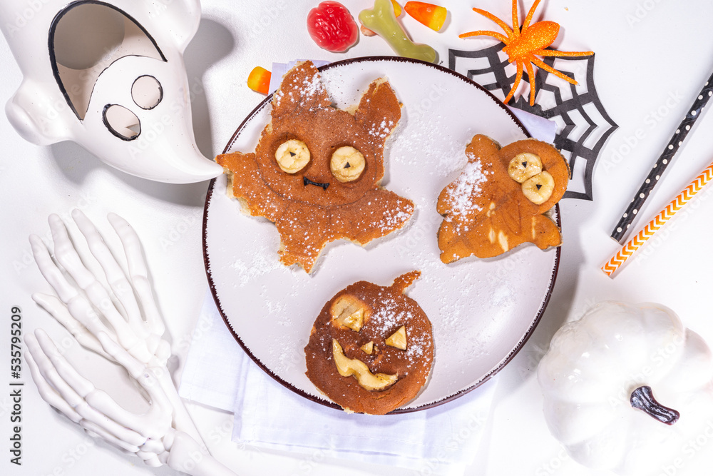 Halloween creative kids breakfast. Cute homemade pancakes in the shape ...