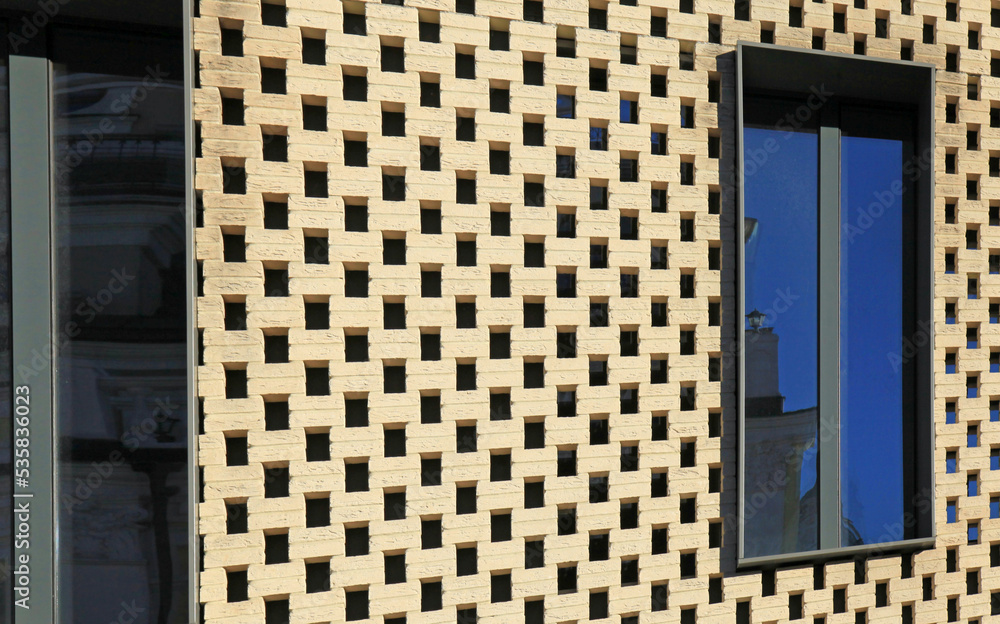 Windows of office building. Hinged and ventilated facade. Honeycomb and ...