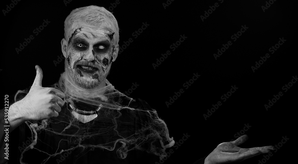 Creepy man with bloody scars face, Halloween stylish zombie make-up ...