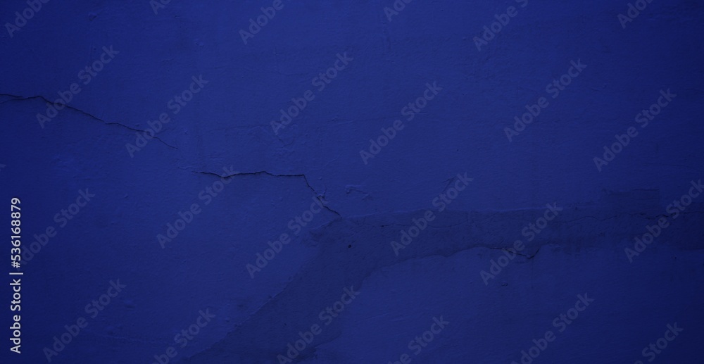 blue background, A textured abstract background image featuring a dark ...