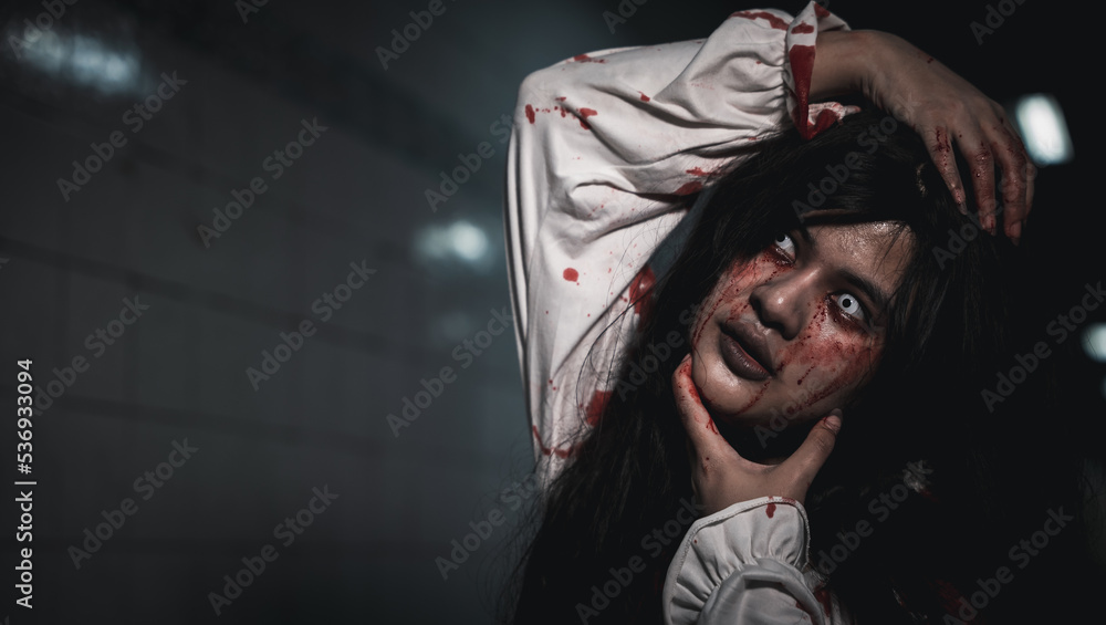 Foto de Stock Happy halloween day concept. Screaming zombie female face ...