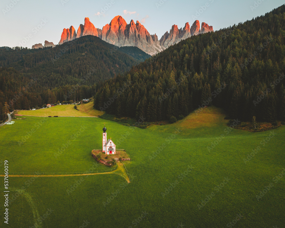 Aerial view of the church Chiesetta di San Giovanni in Ranui, Dolomites ...