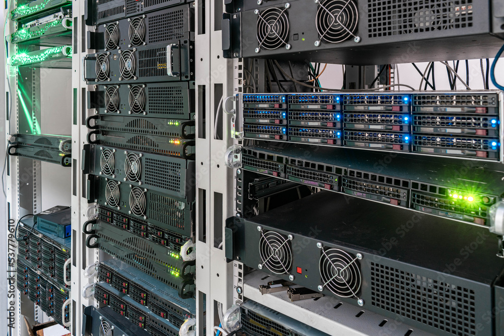 Computer servers run in data center racks. Powerful computing equipment ...