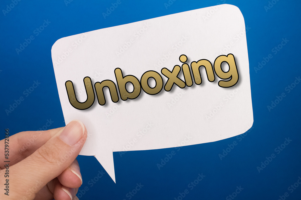 Speech bubble in front of colored background with Unboxing text. Stock ...