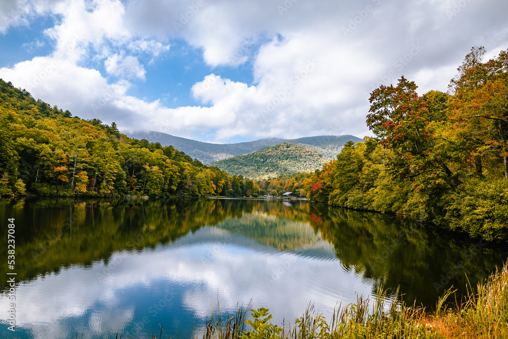 wide open landscape with lake and mountains and cloud with sky ...
