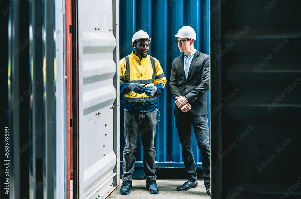 Container operator is discussing their daily routine task before the ...