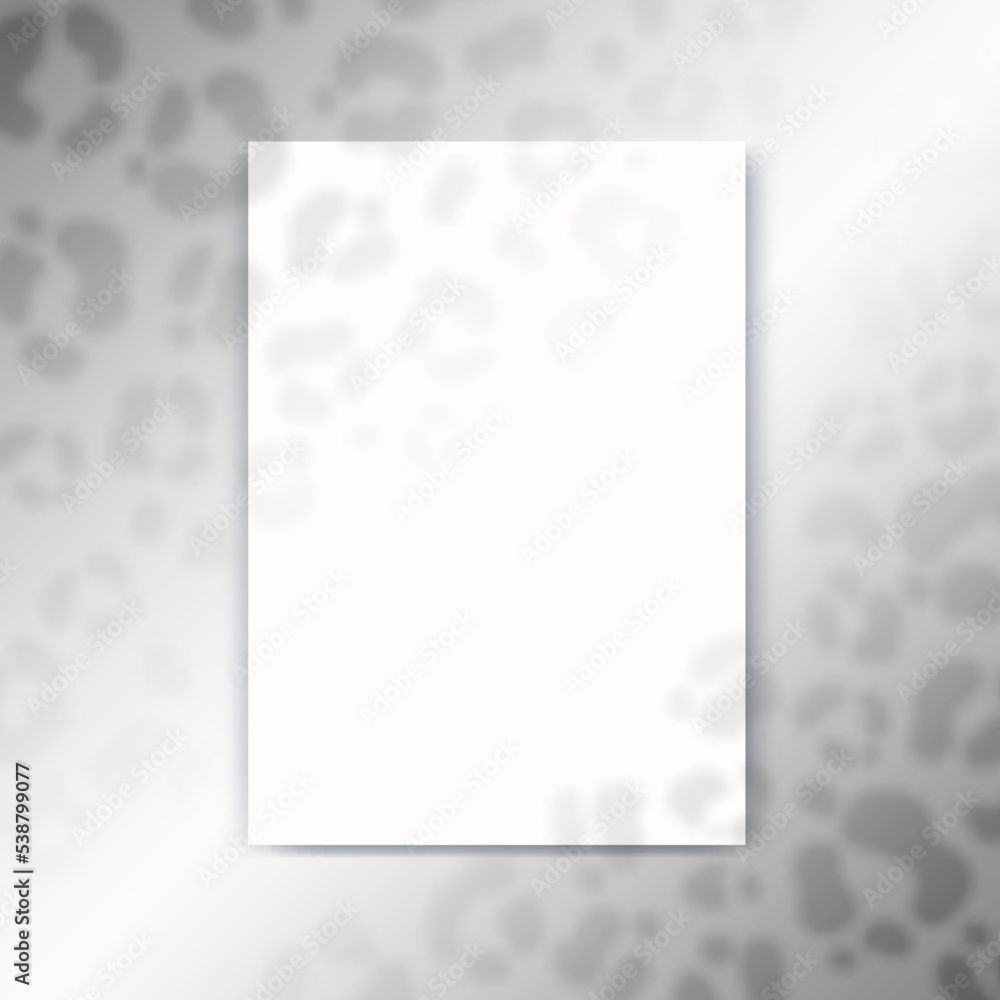 Mock up of empty paper blank. Reflected cheetah print shadow from ...