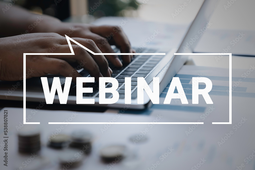 Person using a laptop computer for online training webinars. E-learning ...