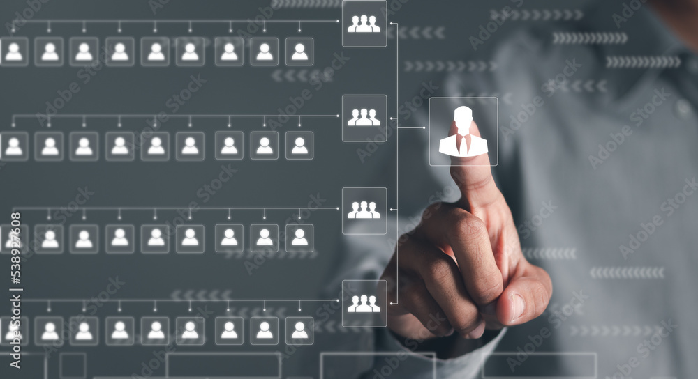 Photo Stock Businessman touching a virtual screen organization chart ...