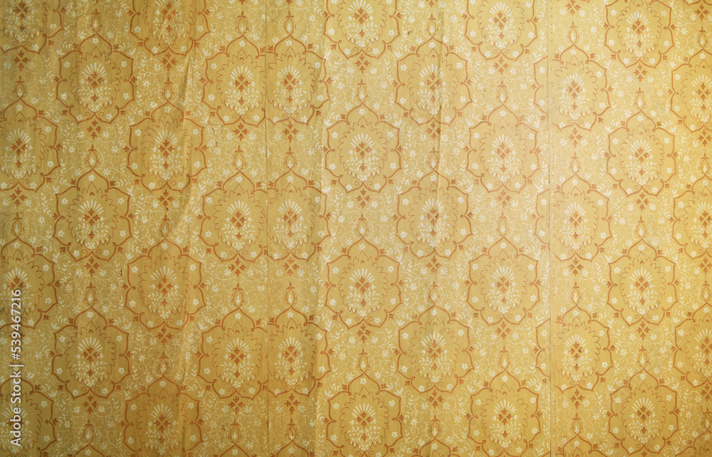 Old wallpaper on the wall. Old wallpaper for texture or background ...