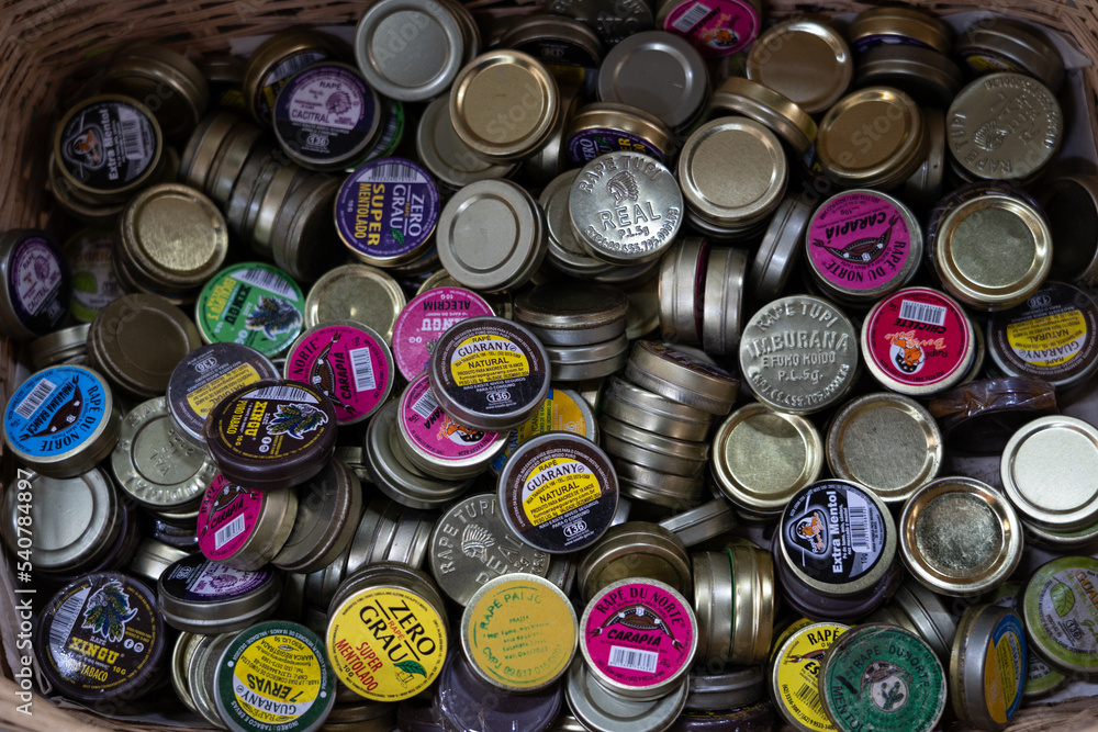 Caetité, Bahia, Brazil October 13, 2022 Close up of colored snuff cans ...
