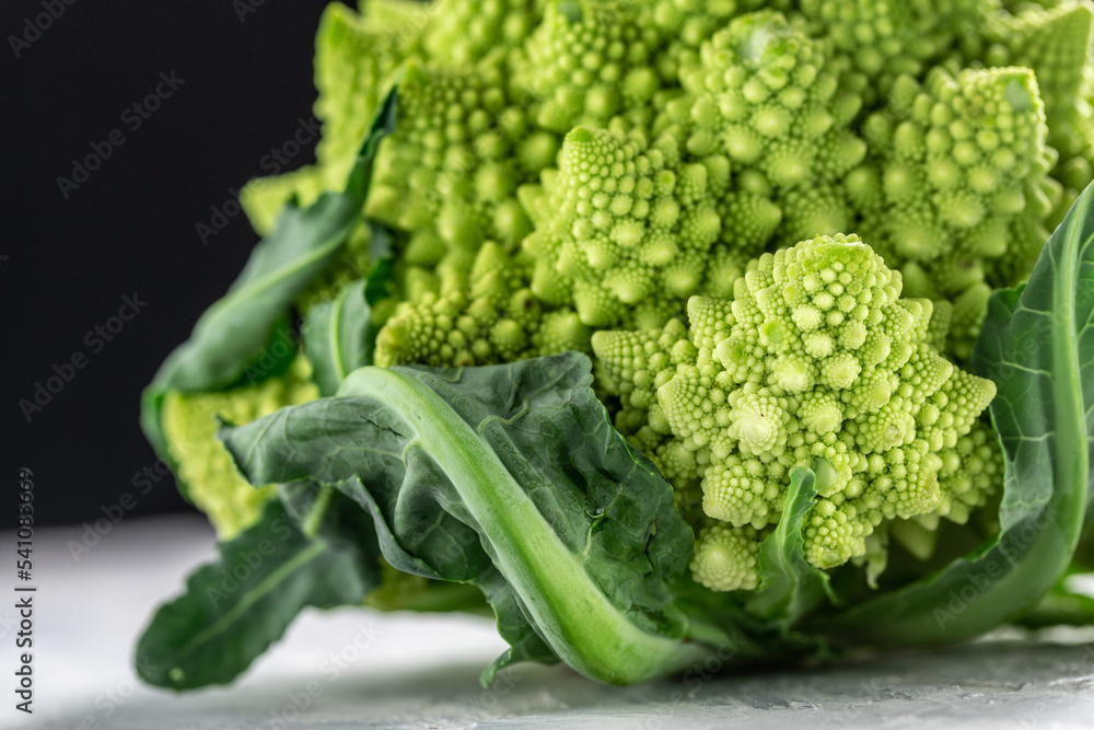 Romanesco broccoli close up. The fractal vegetable is known for it's ...