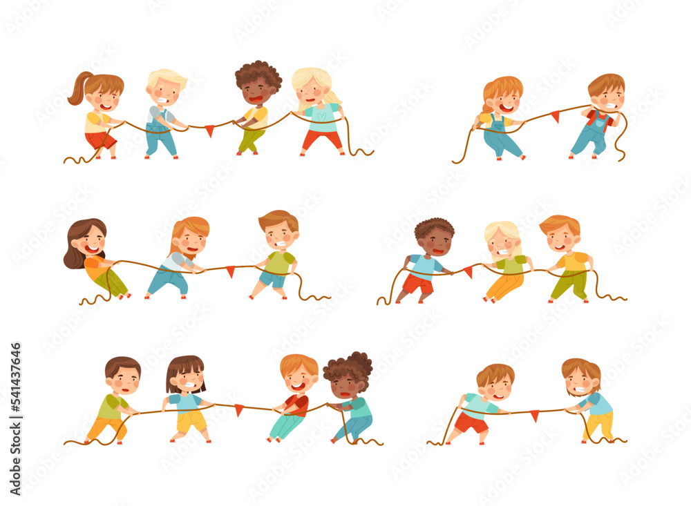 Cute kids playing with rope tug of war. Groups of happy children ...