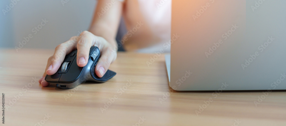 woman hand using ergonomic vertical mouse during working on Adjustable ...