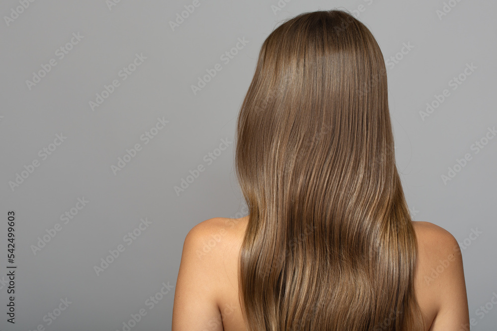 wavy brown hair back view. Grey background Stock Photo | Adobe Stock