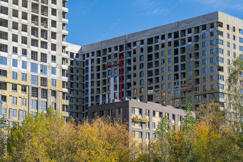 Installation of external wall thermal insulation with rock wool ...