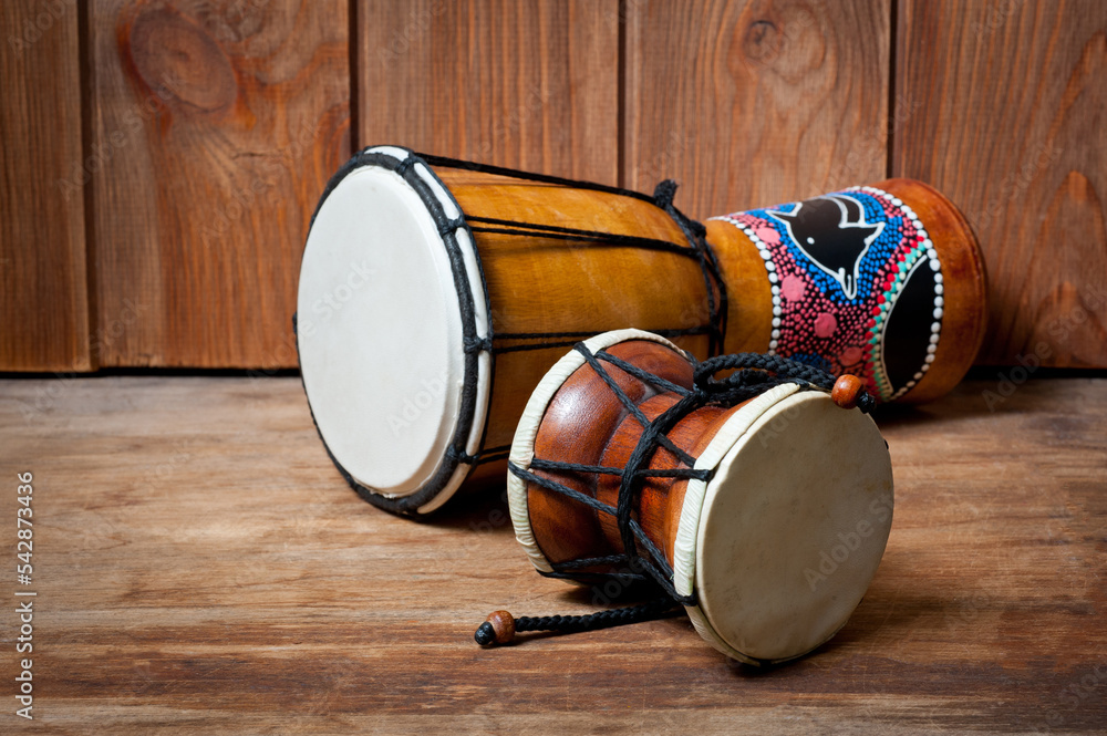 Damaru and djembe drums, percussion and musical instruments. Stock ...