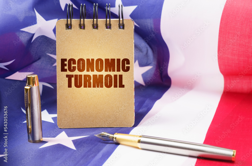 Against the background of the American flag is a notepad with the ...
